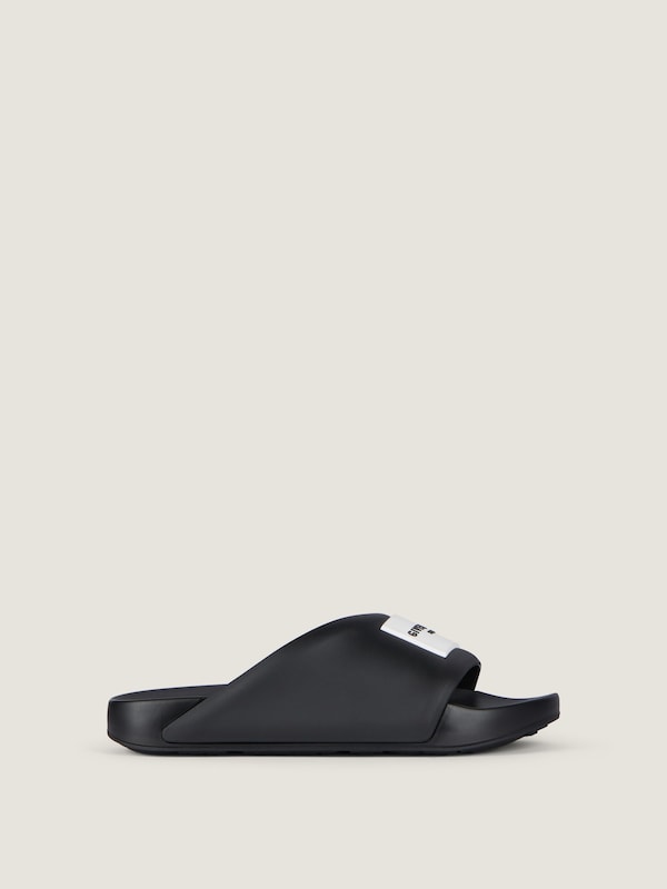 Label flat mules in rubber | Givenchy GB | Givenchy