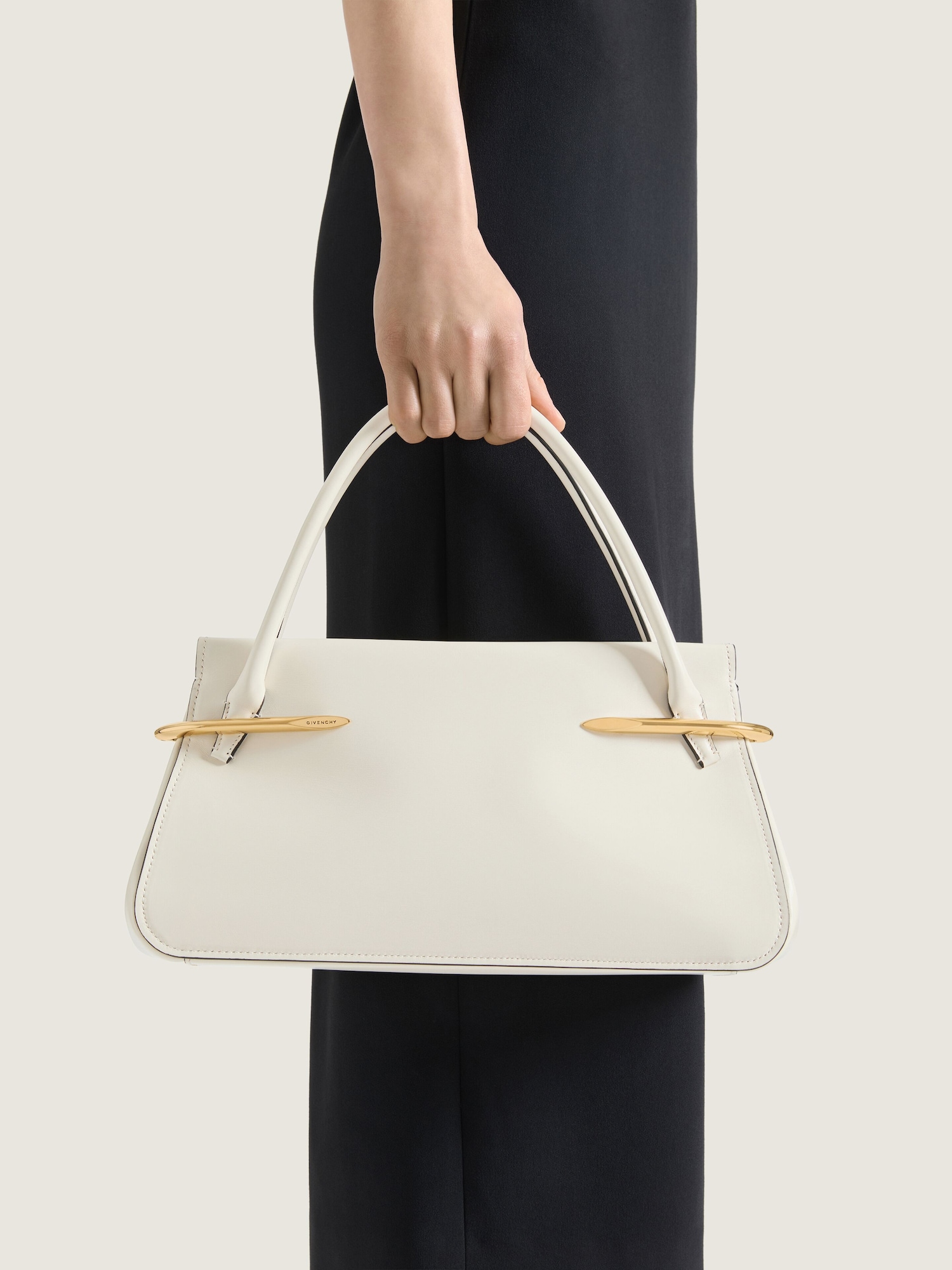 Medium Pinch bag in leather in - ivory | Givenchy US